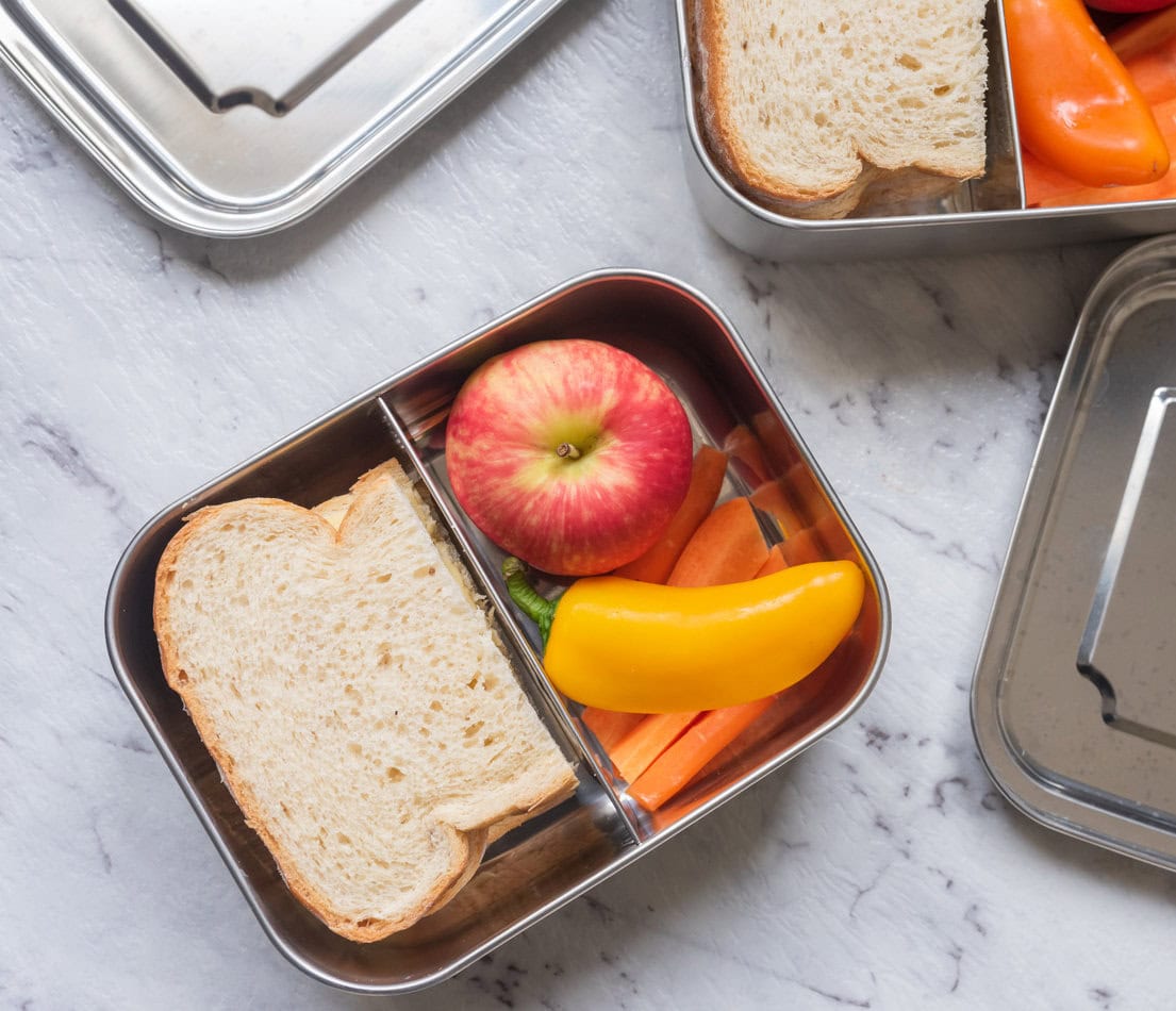 Stainless steel lunch boxes with healthy food from above - zero waste ...